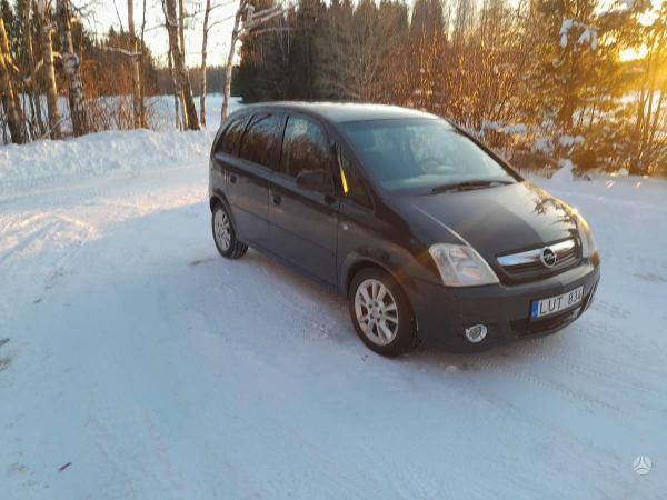 Black Opel Meriva 2006 in Skuodas, with an engine capacity of 1.69 L and mileage of 276 thousand km for 1350 €, photo 1 on AUTOMOTO.COM.LV