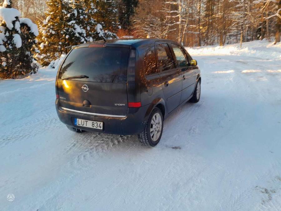 Black Opel Meriva 2006 in Skuodas, with an engine capacity of 1.69 L and mileage of 276 thousand km for 1350 €, photo 3 on AUTOMOTO.COM.LV