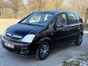 Black Opel Meriva 2006 in Silute, with an engine capacity of 1.70 L and mileage of 248 thousand km for 1100 €, photo 2 on AUTOMOTO.COM.LV