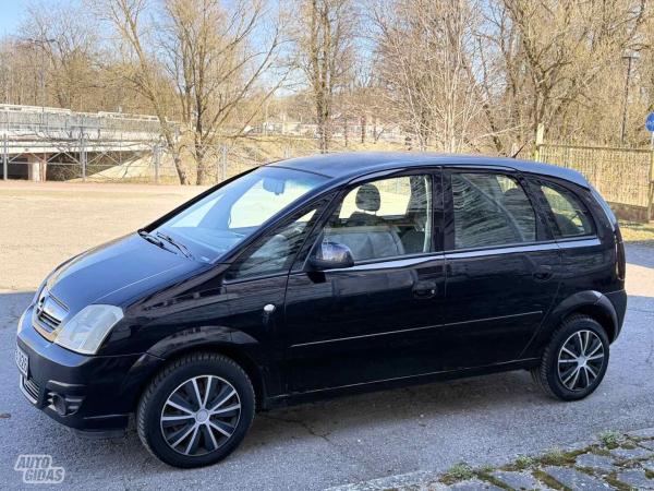 Black Opel Meriva 2006 in Silute, with an engine capacity of 1.70 L and mileage of 248 thousand km for 1100 €, photo 3 on AUTOMOTO.COM.LV