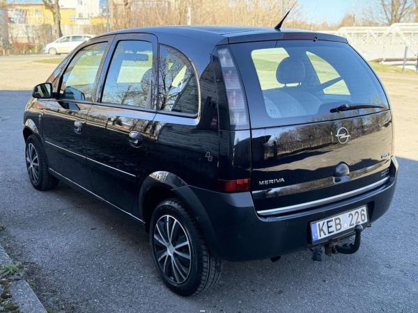 Black Opel Meriva 2006 in Silute, with an engine capacity of 1.70 L and mileage of 248 thousand km for 1100 €, photo 4 on AUTOMOTO.COM.LV