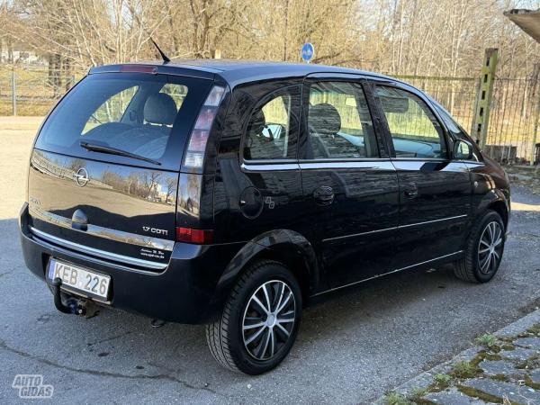 Black Opel Meriva 2006 in Silute, with an engine capacity of 1.70 L and mileage of 248 thousand km for 1100 €, photo 5 on AUTOMOTO.COM.LV