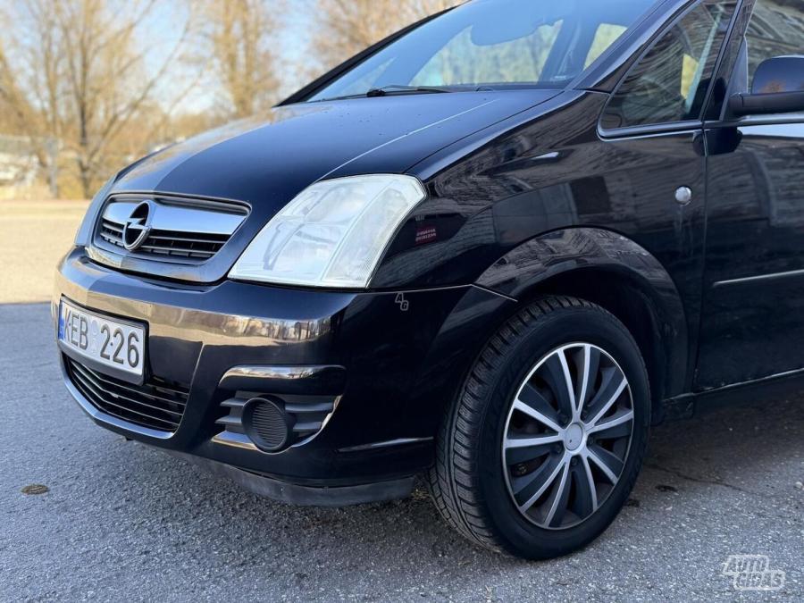 Black Opel Meriva 2006 in Silute, with an engine capacity of 1.70 L and mileage of 248 thousand km for 1100 €, photo 8 on AUTOMOTO.COM.LV