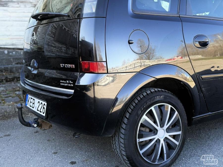 Black Opel Meriva 2006 in Silute, with an engine capacity of 1.70 L and mileage of 248 thousand km for 1100 €, photo 9 on AUTOMOTO.COM.LV