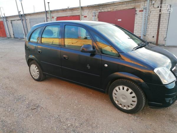 Black Opel Meriva 2008 in Moletai, with an engine capacity of 1.60 L and mileage of 236 thousand km for 1100 €, photo 4 on AUTOMOTO.COM.LV