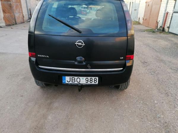 Black Opel Meriva 2008 in Moletai, with an engine capacity of 1.60 L and mileage of 236 thousand km for 1100 €, photo 6 on AUTOMOTO.COM.LV