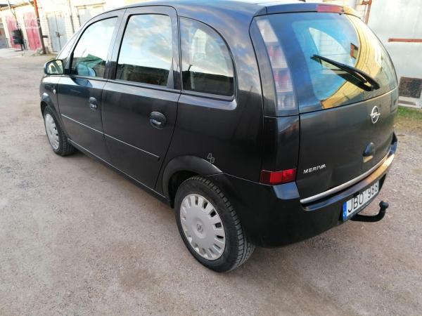 Black Opel Meriva 2008 in Moletai, with an engine capacity of 1.60 L and mileage of 236 thousand km for 1100 €, photo 7 on AUTOMOTO.COM.LV
