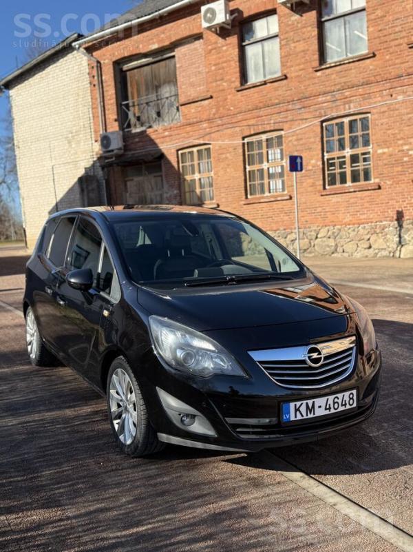 Melns Opel Meriva 2011 Kuldīga, ar dzinēja tilpumu 1.70 L un nobraukumu 275 tūkst. km par 2700 €, foto 2 vietnē AUTOMOTO.COM.LV