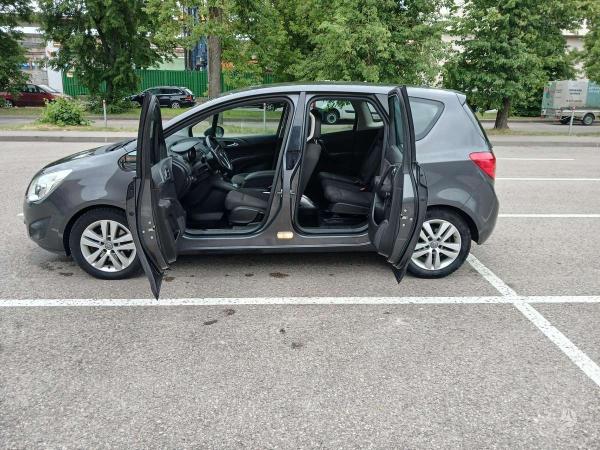 Black Opel Meriva 2011 in Vilnius, with an engine capacity of 1.69 L and mileage of 239 thousand km for 4190 €, photo 8 on AUTOMOTO.COM.LV