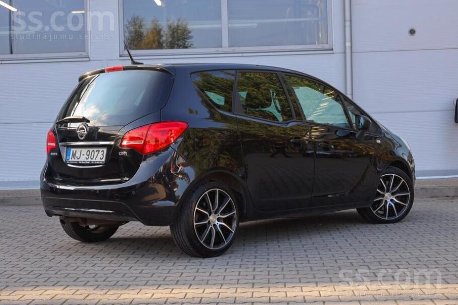 Black Opel Meriva 2011 in Riga, with an engine capacity of 1.70 L and mileage of 205 thousand km for 2995 €, photo 8 on AUTOMOTO.COM.LV