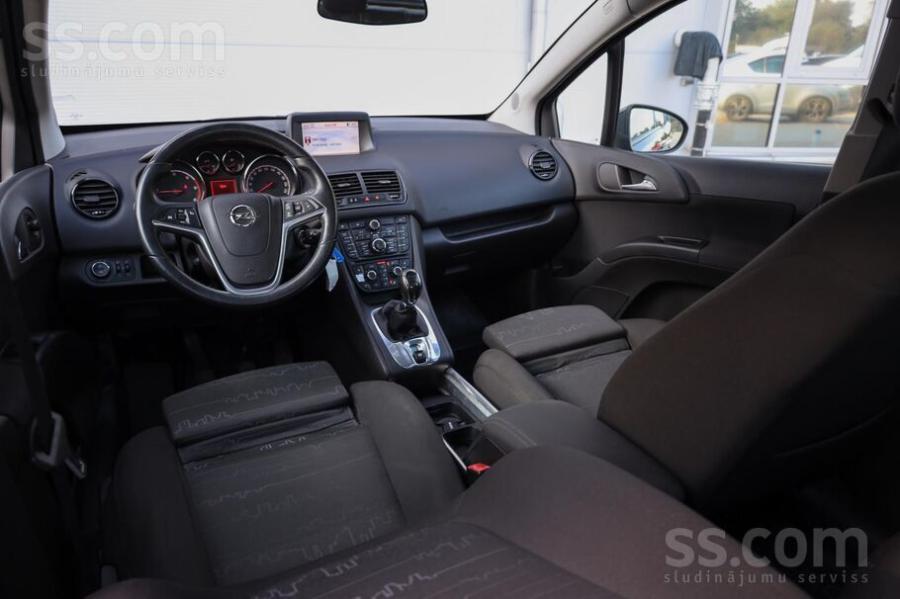 Black Opel Meriva 2011 in Riga, with an engine capacity of 1.70 L and mileage of 205 thousand km for 2995 €, photo 12 on AUTOMOTO.COM.LV