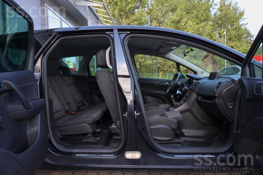 Black Opel Meriva 2011 in Riga, with an engine capacity of 1.70 L and mileage of 205 thousand km for 2995 €, photo 15 on AUTOMOTO.COM.LV