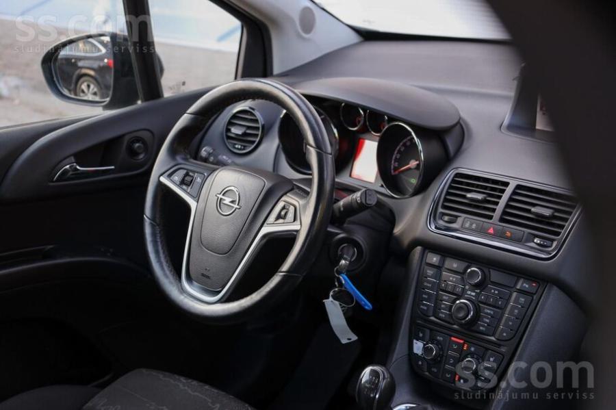 Black Opel Meriva 2011 in Riga, with an engine capacity of 1.70 L and mileage of 205 thousand km for 2995 €, photo 18 on AUTOMOTO.COM.LV