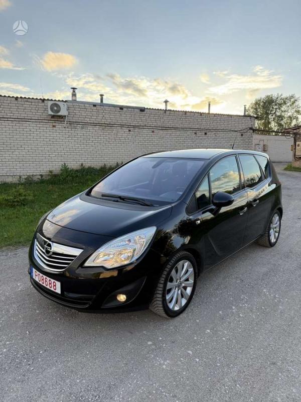 Black Opel Meriva 2012 in Kaunas, with an engine capacity of 1.36 L and mileage of 242 thousand km for 2950 €, photo 1 on AUTOMOTO.COM.LV