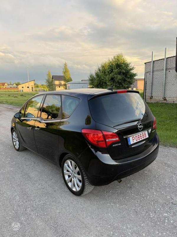 Black Opel Meriva 2012 in Kaunas, with an engine capacity of 1.36 L and mileage of 242 thousand km for 2950 €, photo 3 on AUTOMOTO.COM.LV