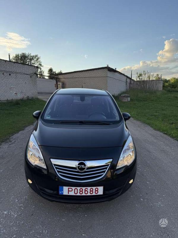 Black Opel Meriva 2012 in Kaunas, with an engine capacity of 1.36 L and mileage of 242 thousand km for 2950 €, photo 8 on AUTOMOTO.COM.LV