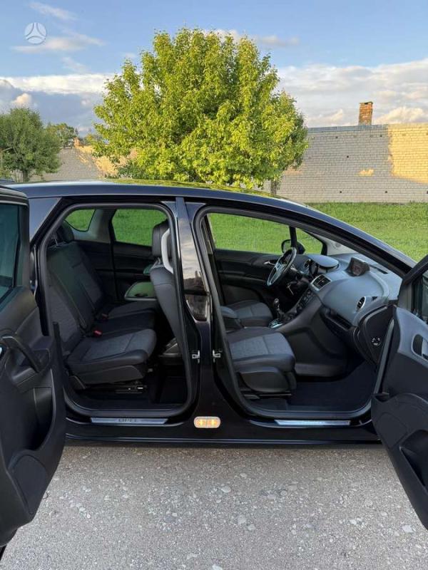 Black Opel Meriva 2012 in Kaunas, with an engine capacity of 1.36 L and mileage of 242 thousand km for 2950 €, photo 10 on AUTOMOTO.COM.LV