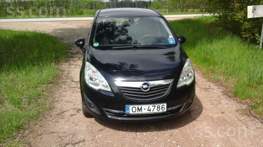 Black Opel Meriva 2012 in Ogre, with an engine capacity of 1.40 L and mileage of 189 thousand km for 4390 €, photo 8 on AUTOMOTO.COM.LV