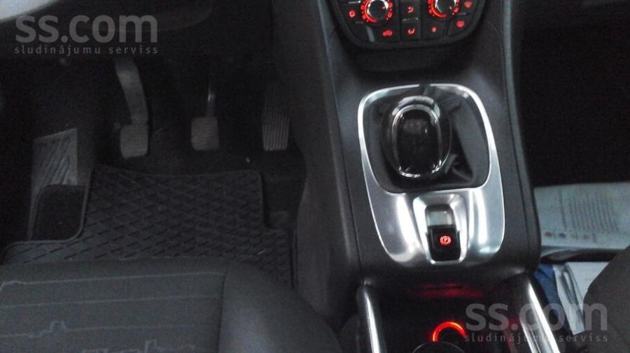 Black Opel Meriva 2012 in Ogre, with an engine capacity of 1.40 L and mileage of 189 thousand km for 4390 €, photo 23 on AUTOMOTO.COM.LV