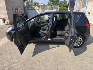 Black Opel Meriva 2012 in Kaunas, with an engine capacity of 1.25 L and mileage of 294 thousand km for 2750 €, photo 11 on AUTOMOTO.COM.LV