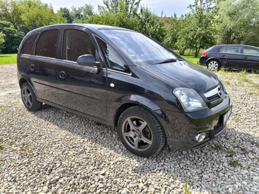 Melns Opel Meriva 2009 Šauļi, ar dzinēja tilpumu 1.80 L un nobraukumu 215 tūkst. km par 2000 €, foto 1 vietnē AUTOMOTO.COM.LV