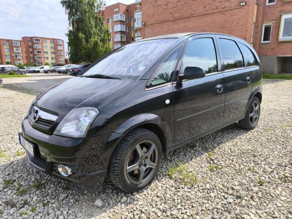 Black Opel Meriva 2009 in Siauliai, with an engine capacity of 1.80 L and mileage of 215 thousand km for 2000 €, photo 2 on AUTOMOTO.COM.LV