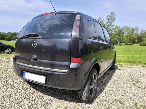Black Opel Meriva 2009 in Siauliai, with an engine capacity of 1.80 L and mileage of 215 thousand km for 2000 €, photo 7 on AUTOMOTO.COM.LV