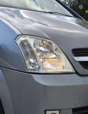 Blue Opel Meriva 2004 in Kretinga, with an engine capacity of 1.69 L and mileage of 186 thousand km for 999 €, photo 6 on AUTOMOTO.COM.LV