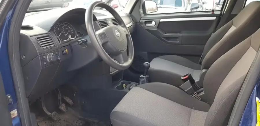Blue Opel Meriva 2005 in Valmiera, with an engine capacity of 1.40 L and mileage of 214 thousand km for 1250 €, photo 11 on AUTOMOTO.COM.LV