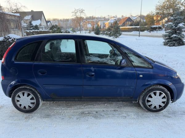 Blue Opel Meriva 2004 in Kaunas, with an engine capacity of 1.70 L and mileage of 225 thousand km for 950 €, photo 6 on AUTOMOTO.COM.LV