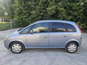 Zils Opel Meriva 2006 Viļņa, ar dzinēja tilpumu 1.60 L un nobraukumu 112 tūkst. km par 1200 €, foto 12 vietnē AUTOMOTO.COM.LV
