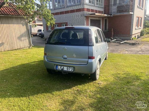 Blue Opel Meriva 2006 in Plunge, with an engine capacity of 1.60 L and mileage of 269 thousand km for 950 €, photo 5 on AUTOMOTO.COM.LV