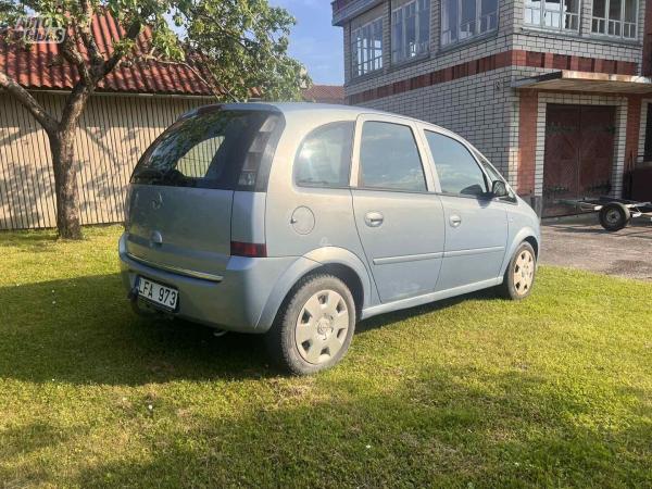 Blue Opel Meriva 2006 in Plunge, with an engine capacity of 1.60 L and mileage of 269 thousand km for 950 €, photo 7 on AUTOMOTO.COM.LV
