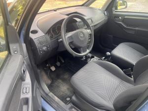 Blue Opel Meriva 2006 in Plunge, with an engine capacity of 1.60 L and mileage of 269 thousand km for 950 €, photo 11 on AUTOMOTO.COM.LV
