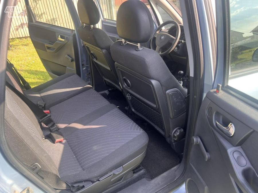 Blue Opel Meriva 2006 in Plunge, with an engine capacity of 1.60 L and mileage of 269 thousand km for 950 €, photo 14 on AUTOMOTO.COM.LV