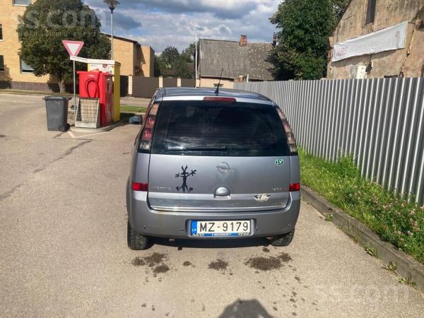 Опель Мерива 2006 в Даугавпилс на AUTOMOTO.COM.LV Синий Опель Мерива 2006 в Даугавпилс, объемом двигателя 1.70 л и пробегом 240 тыс. км за 1450 €, фото 3 на AUTOMOTO.COM.LV