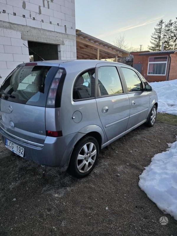 Blue Opel Meriva 2006 in Pakruojis, with an engine capacity of 1.60 L and mileage of 271 thousand km for 999 €, photo 4 on AUTOMOTO.COM.LV
