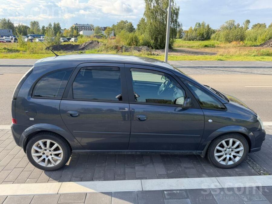 Zils Opel Meriva 2009 Rīga, ar dzinēja tilpumu 1.70 L un nobraukumu 311 tūkst. km par 1450 €, foto 4 vietnē AUTOMOTO.COM.LV