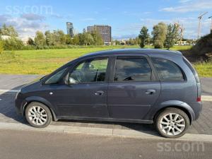 Zils Opel Meriva 2009 Rīga, ar dzinēja tilpumu 1.70 L un nobraukumu 311 tūkst. km par 1450 €, foto 7 vietnē AUTOMOTO.COM.LV