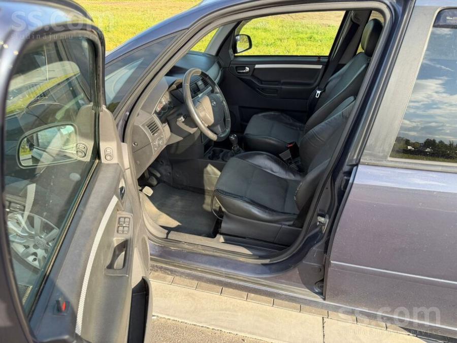Zils Opel Meriva 2009 Rīga, ar dzinēja tilpumu 1.70 L un nobraukumu 311 tūkst. km par 1450 €, foto 11 vietnē AUTOMOTO.COM.LV