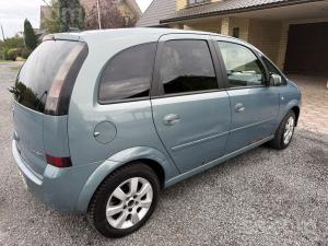 Green Opel Meriva 2006 in Saldus, with an engine capacity of 1.70 L and mileage of 305 thousand km for 990 €, photo 8 on AUTOMOTO.COM.LV