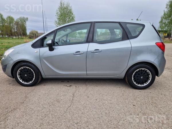 Green Opel Meriva 2011 in Ogre, with an engine capacity of 1.40 L and mileage of 202 thousand km for 5350 €, photo 8 on AUTOMOTO.COM.LV