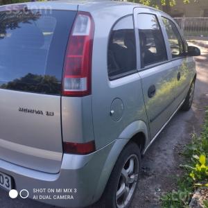Pelēks Opel Meriva 2004 Rīga, ar dzinēja tilpumu 1.60 L un nobraukumu 260 tūkst. km par 950 €, foto 4 vietnē AUTOMOTO.COM.LV