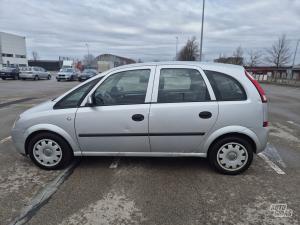 Grey Opel Meriva 2004 in Klaipeda, with an engine capacity of 1.70 L and mileage of 209 thousand km for 990 €, photo 9 on AUTOMOTO.COM.LV