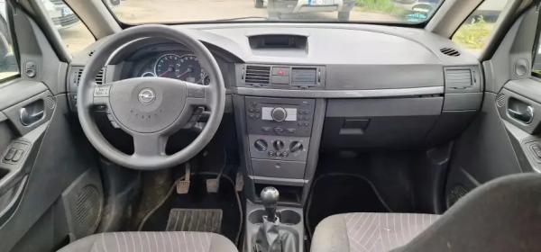 Grey Opel Meriva 2006 in Valmiera, with an engine capacity of 1.40 L and mileage of 226 thousand km for 1400 €, photo 7 on AUTOMOTO.COM.LV