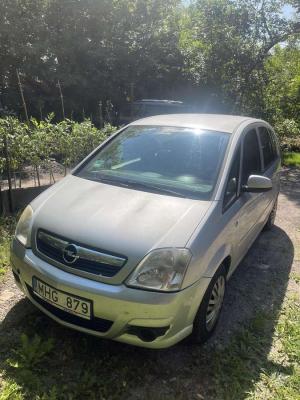 Grey Opel Meriva 2006 in Vilnius, with an engine capacity of 1.25 L and mileage of 244 thousand km for 700 €, photo  on AUTOMOTO.COM.LV