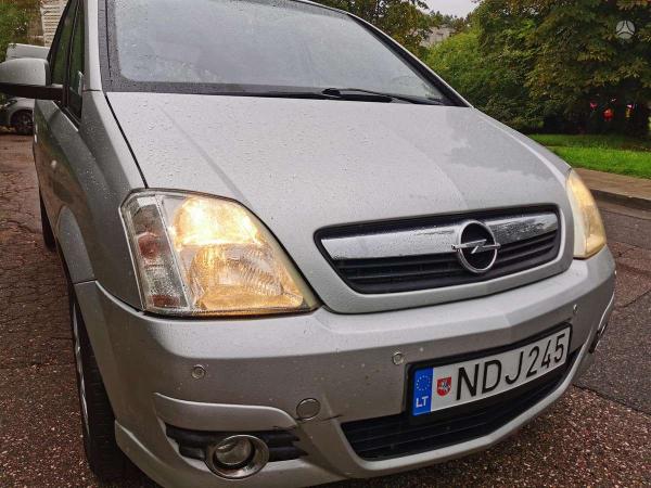 Grey Opel Meriva 2009 in Vilnius, with an engine capacity of 1.69 L and mileage of 301 thousand km for 470 €, photo 11 on AUTOMOTO.COM.LV