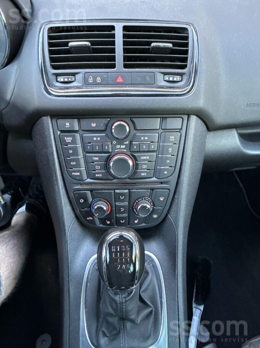 Grey Opel Meriva 2012 in Ogre, with an engine capacity of 1.60 L and mileage of 143 thousand km for 5495 €, photo 26 on AUTOMOTO.COM.LV