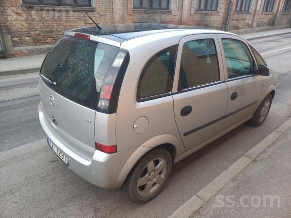 Pelēks Opel Meriva 2004 Rīga, ar dzinēja tilpumu 1.60 L un nobraukumu 344 tūkst. km par 1200 €, foto 7 vietnē AUTOMOTO.COM.LV
