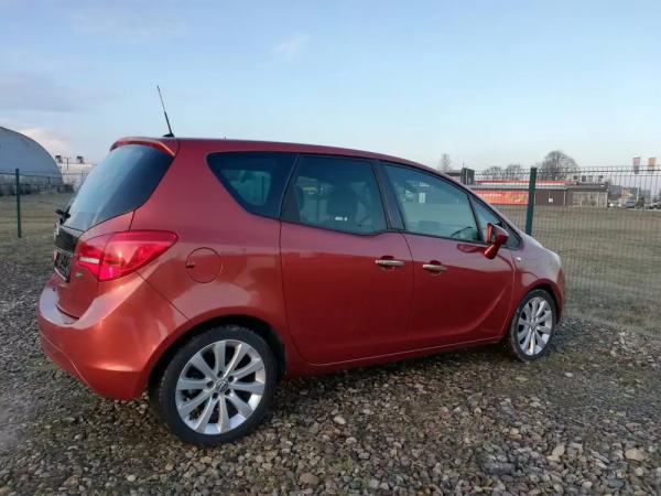 Orange Opel Meriva 2012 in Saldus, with an engine capacity of 1.70 L and mileage of 250 thousand km for 4990 €, photo 2 on AUTOMOTO.COM.LV
